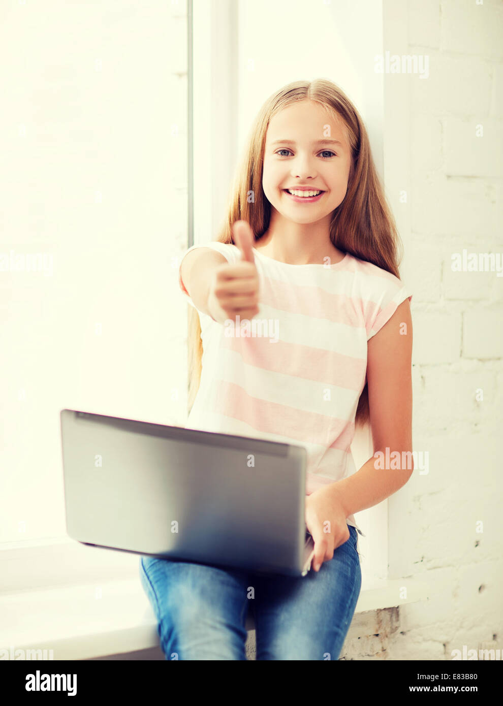 girl with laptop pc at school Stock Photo - Alamy