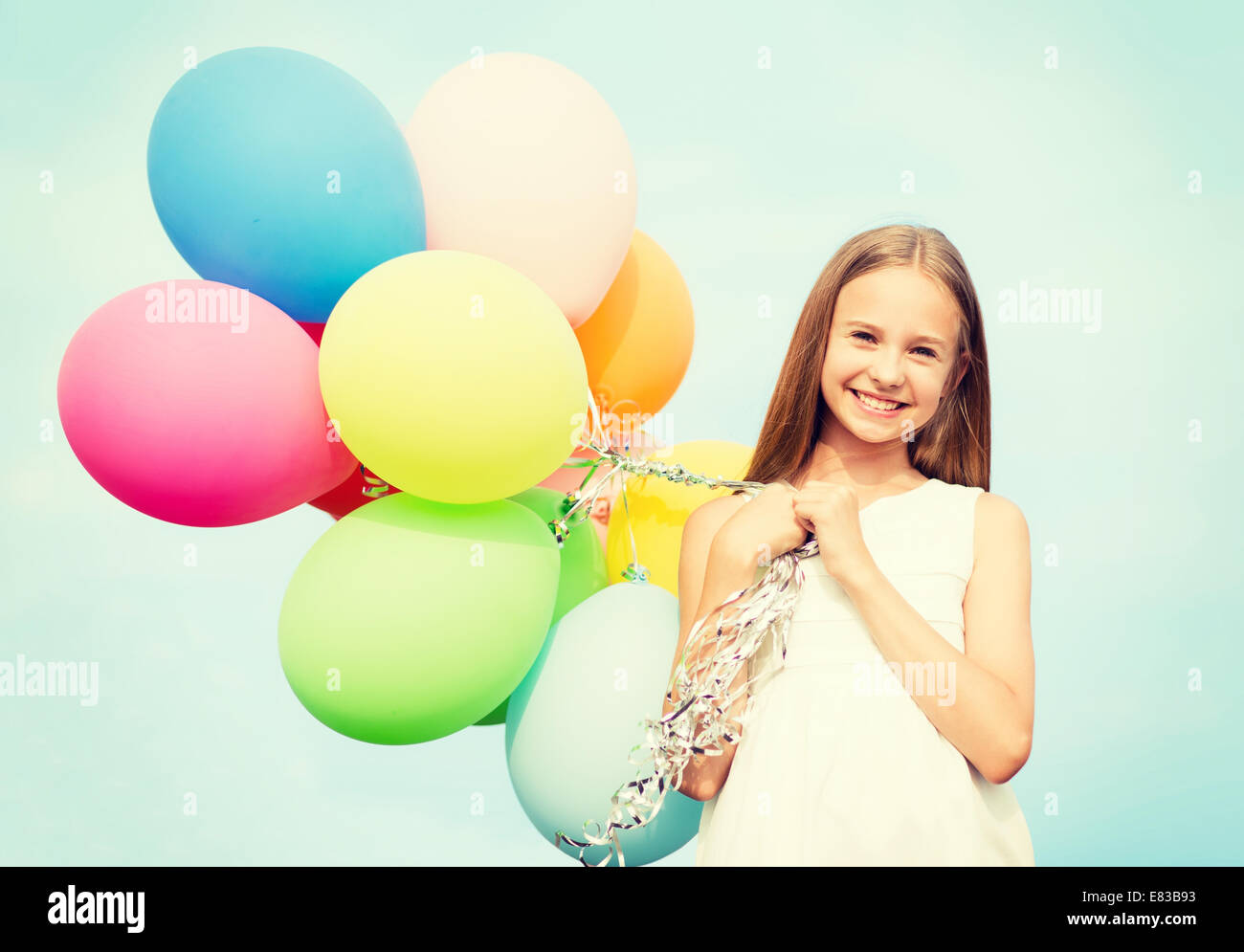 happy girl with colorful balloons Stock Photo - Alamy