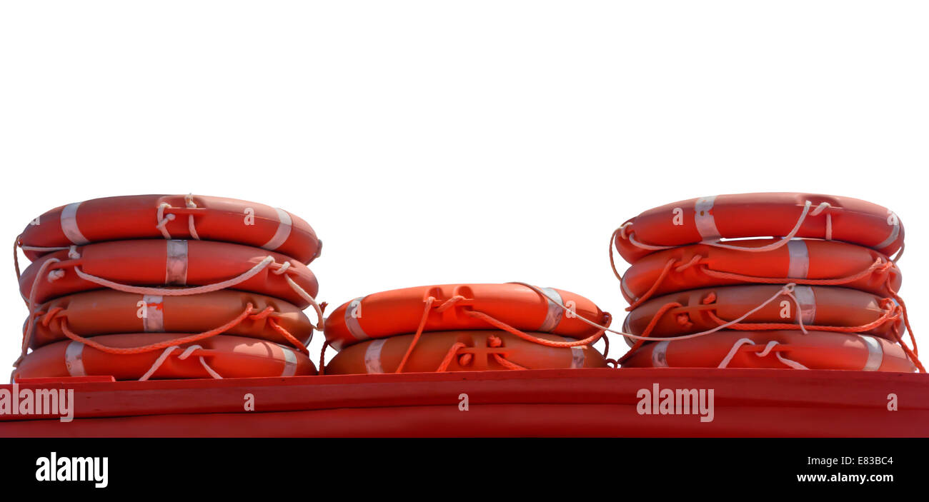 Life preserver rings in orange color stacked, isolated on white Stock ...