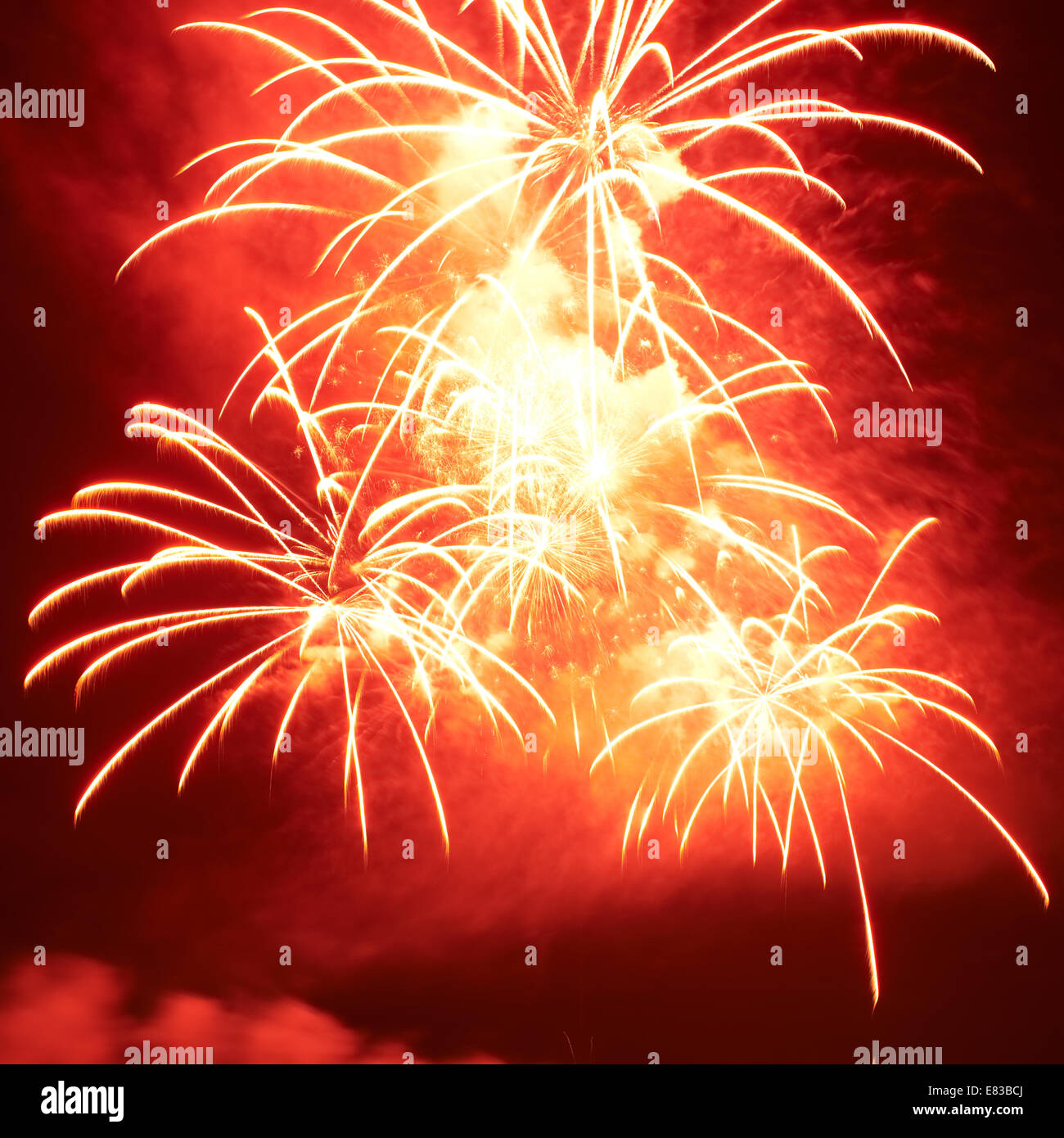 Red colorful fireworks on the black sky background Stock Photo - Alamy