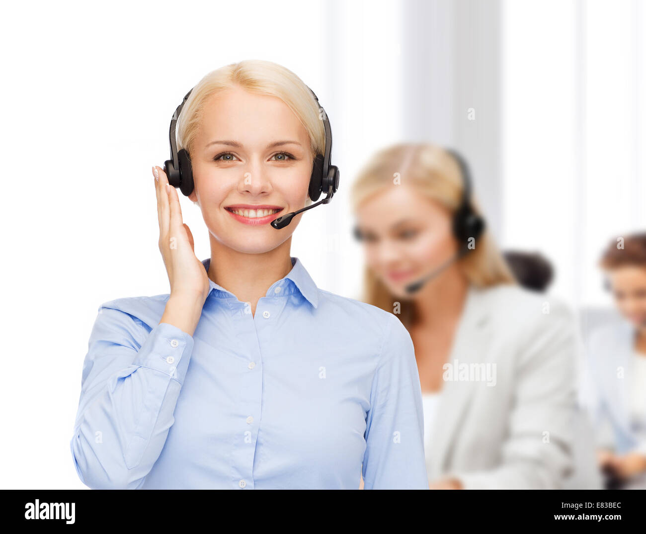 friendly female helpline operator Stock Photo - Alamy