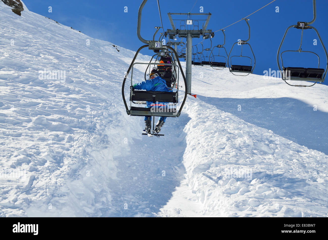 Ski lift above the snow slope Stock Photo - Alamy
