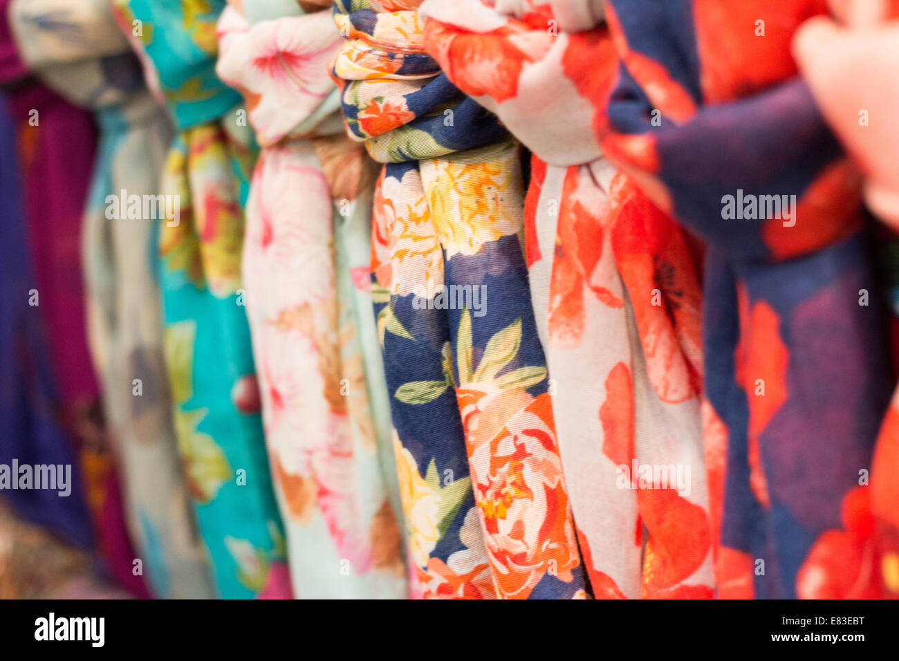 Silk Scarves on display in a shop Stock Photo - Alamy