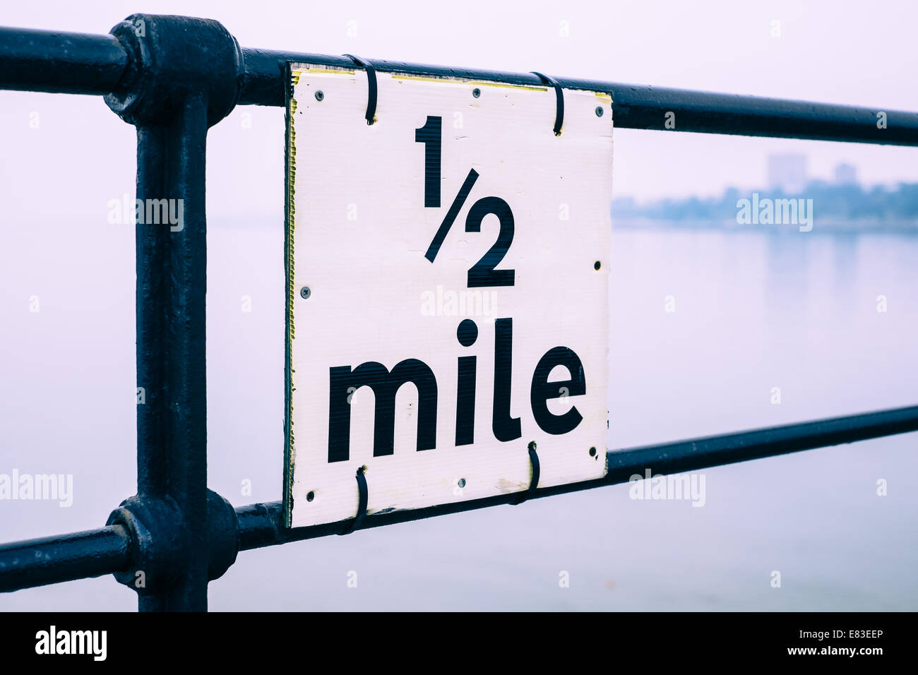 1/2 Mile Sign, Southend Pier, with blue cross processing effect Stock ...