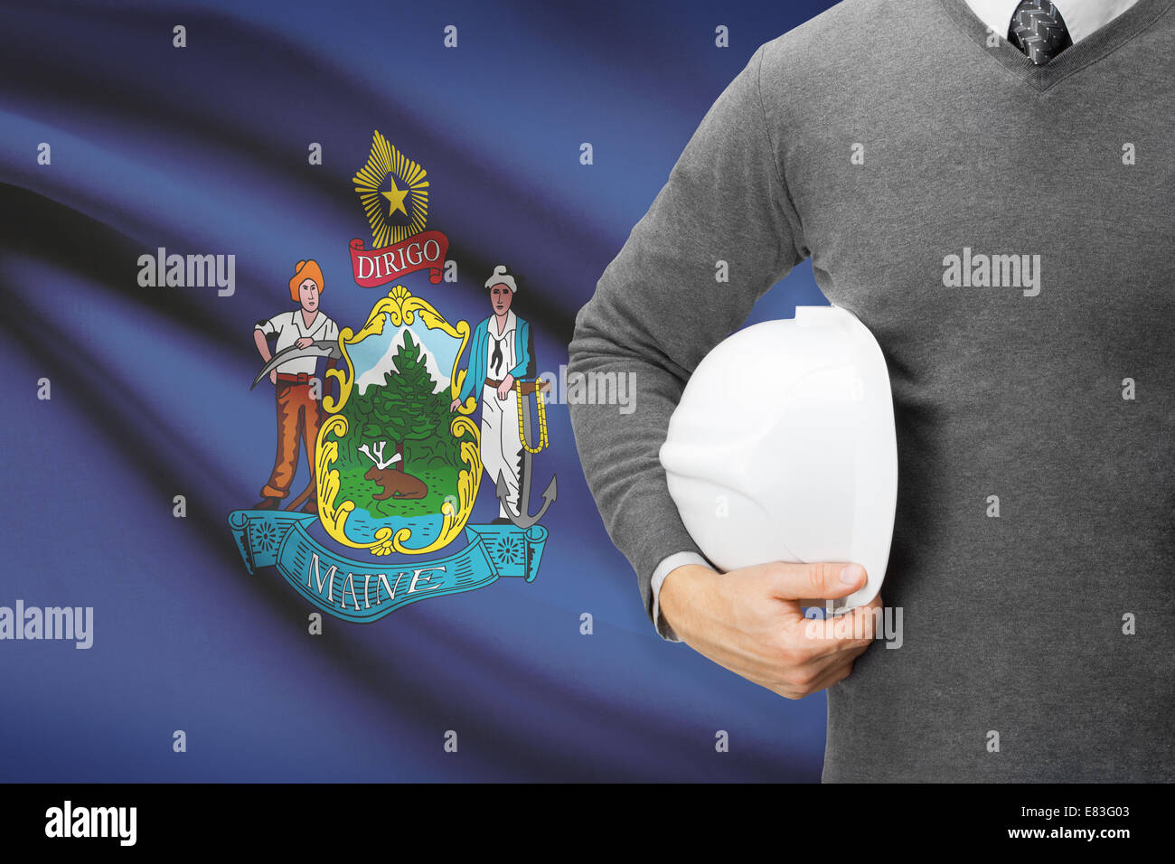 Engineer with flag on background series - Maine Stock Photo - Alamy