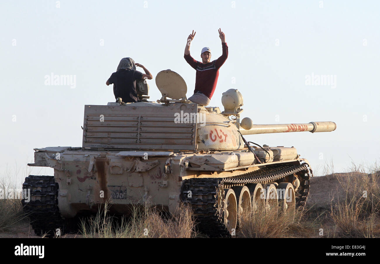 Tripoli, Libya. 29th Sep, 2014. A Libya Dawn fighter poses for picture ...