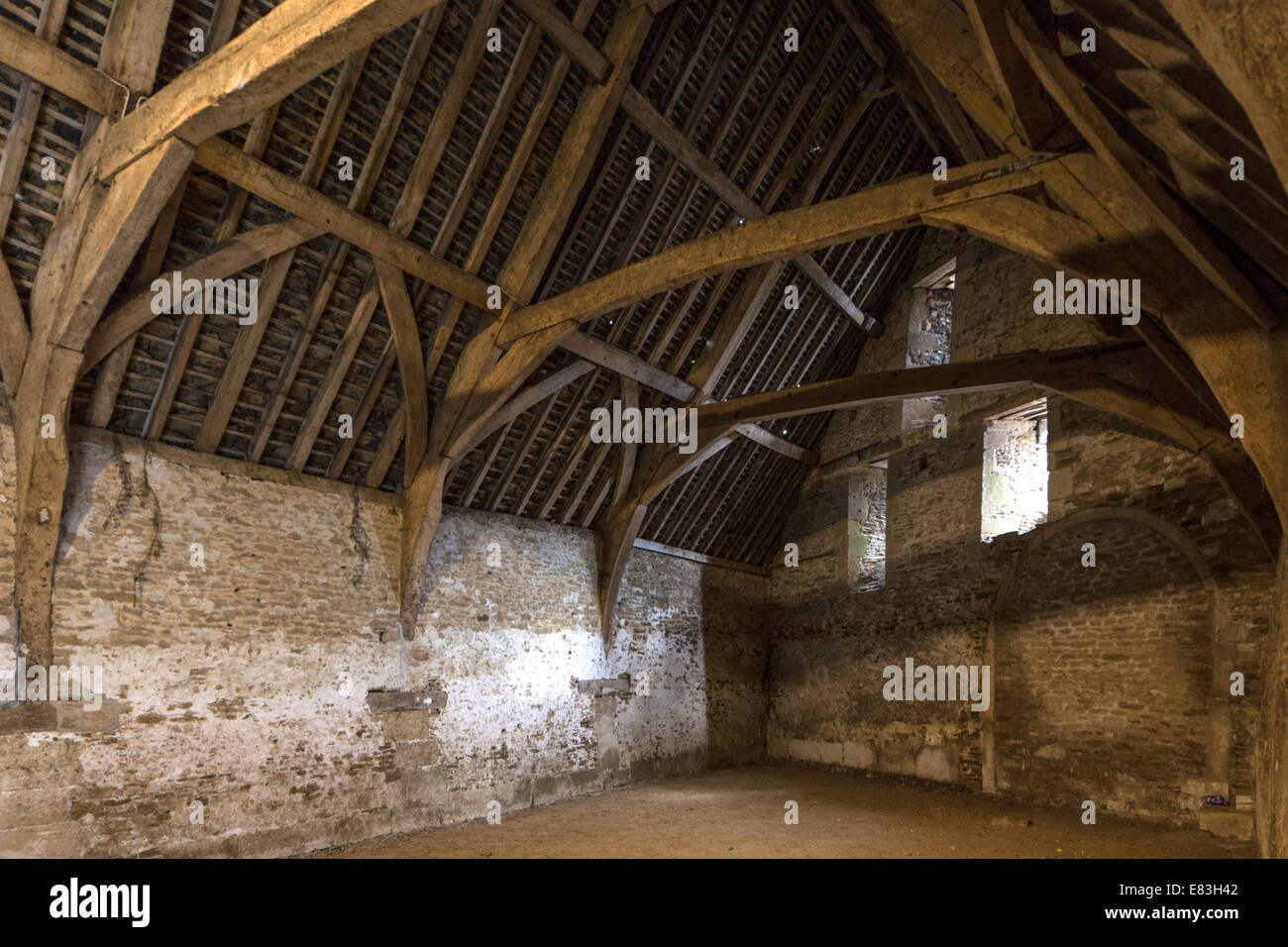 The interior of the 14th Century Tithe Barn with its crook frame timber ...