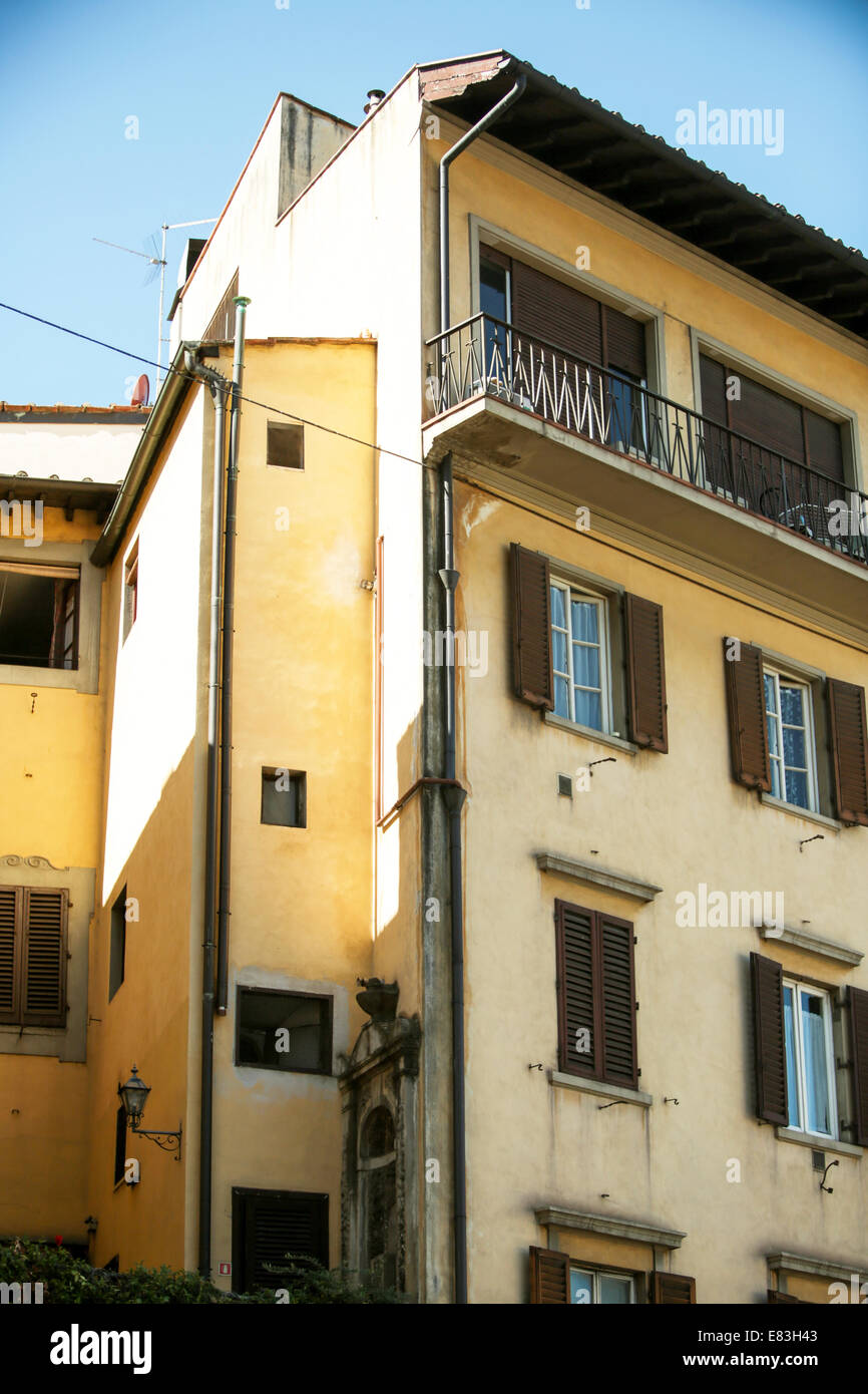 This shows typical city apartment block with blinds surrounding the ...