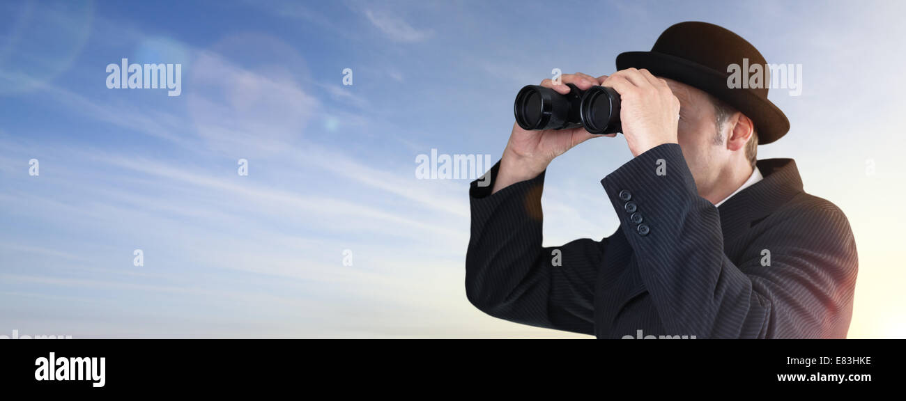 Businessman looking through binoculars Stock Photo - Alamy Businessman looking through binoculars Stock Photo - Alamy