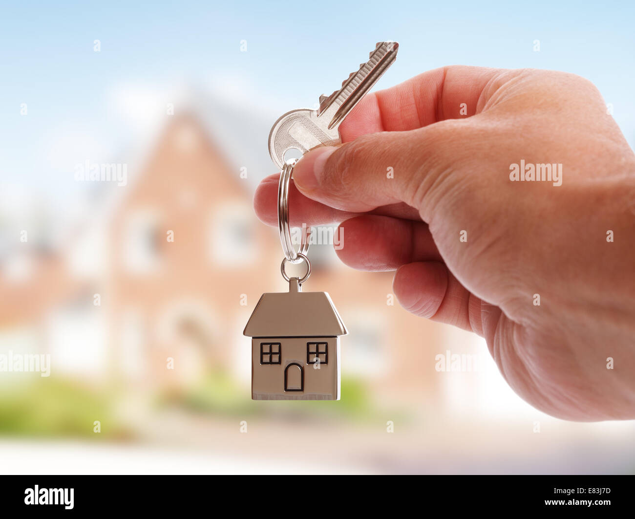 Giving house keys Stock Photo - Alamy