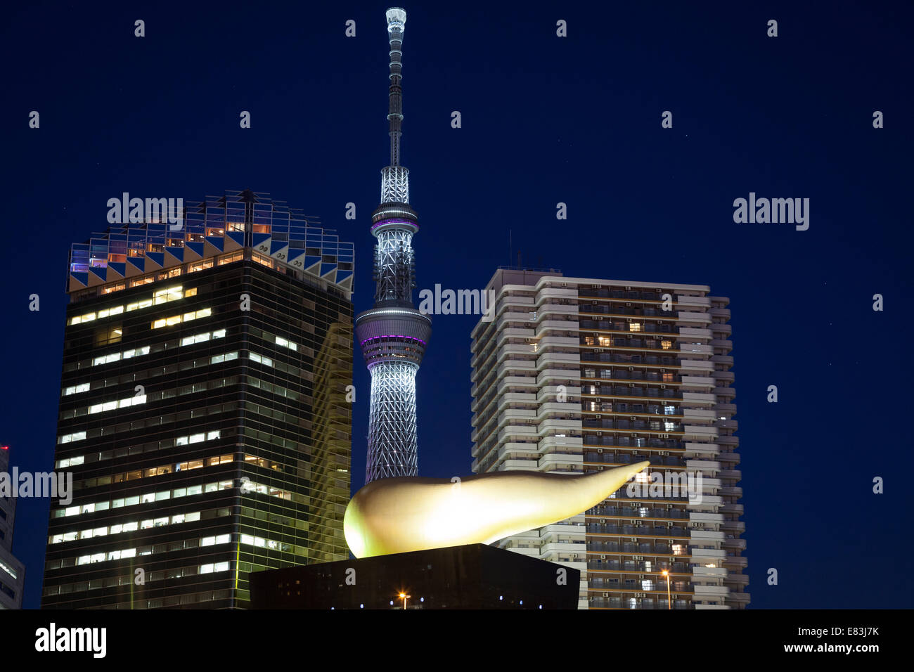 Tokyo Skytree and the Asahi Beer hall illuminated at night, Asakusa ...