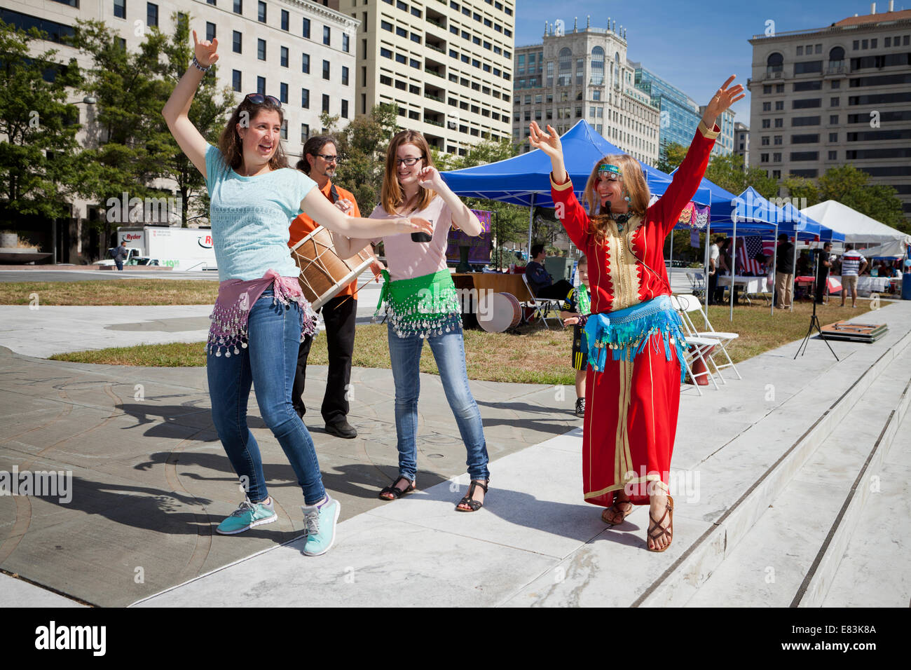 Cultural festival goers learning Turkish bellydance (Tsifteteli) - USA ...