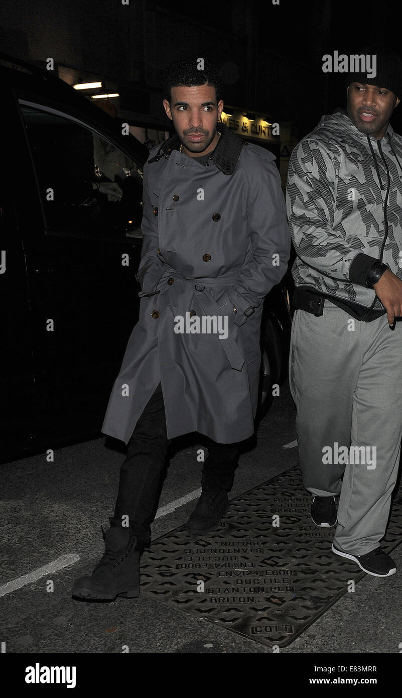 Rihanna and new boyfriend Drake, arrive at private members club Tramps ...