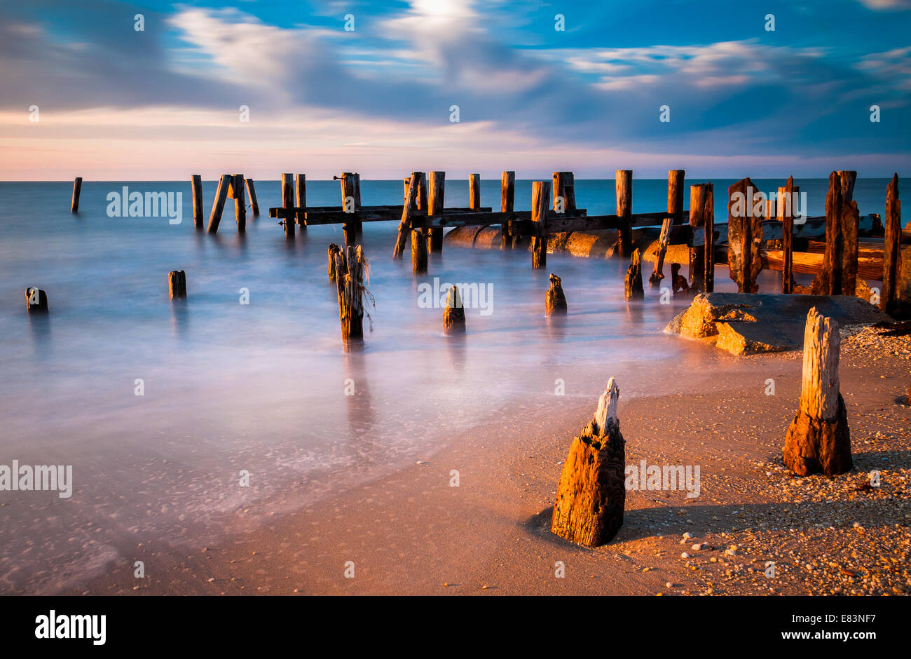 Long exposure at sunset of pier pilings in the Delaware Bay at Sunset ...