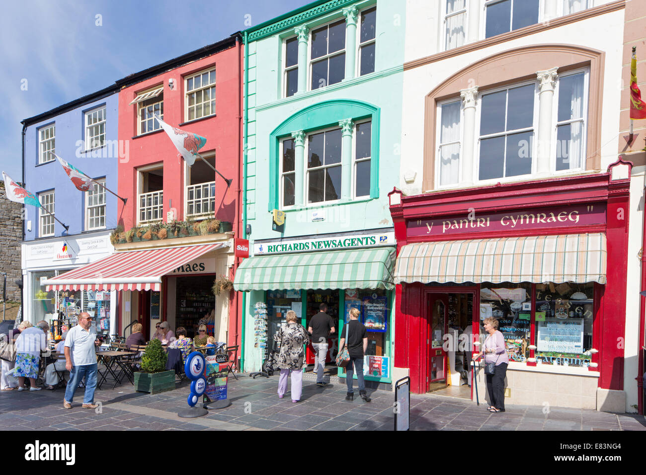 Brightly painted shops in Caernarfon, Gwynedd, North-West Wales, UK ...