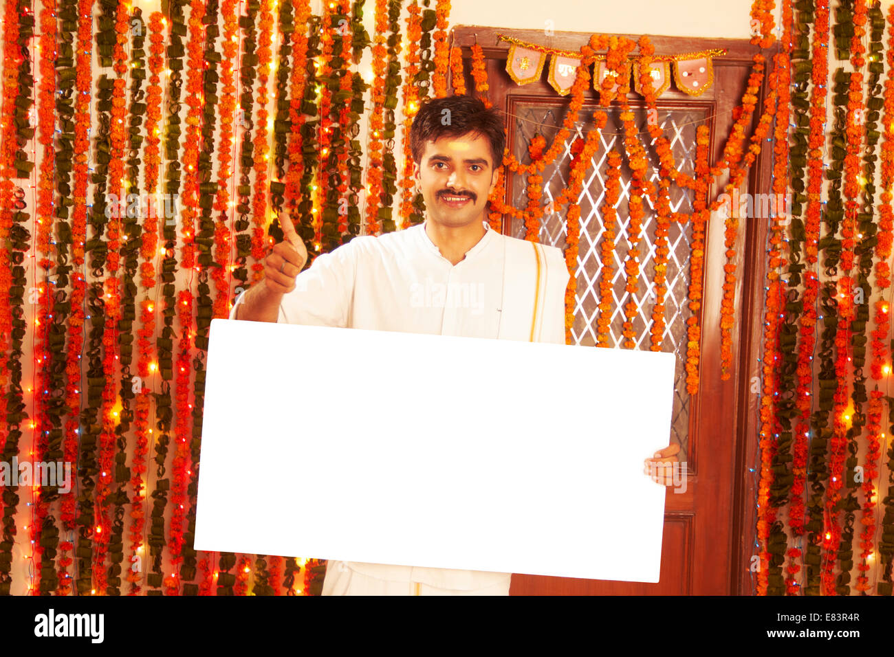 South indian man standing thumbs hi-res stock photography and images ...