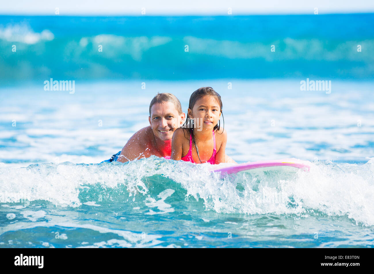 Surfing sea family hi-res stock photography and images - Alamy
