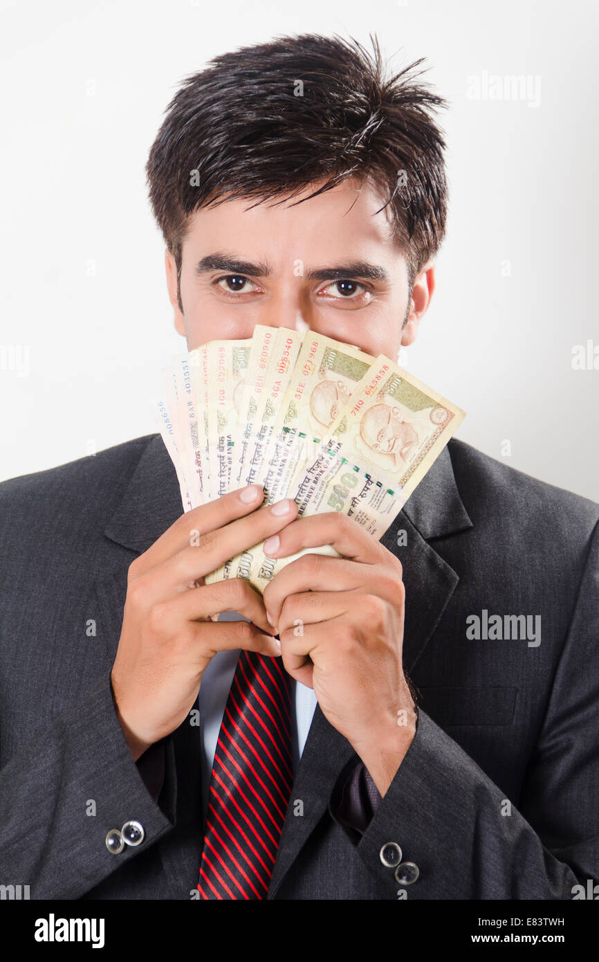 indian Business Man Saving Money Stock Photo - Alamy