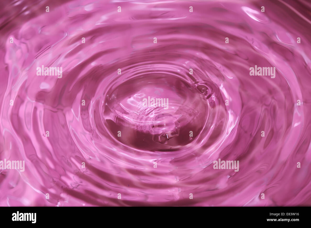 Close-up macro of a wave from water drop droplet Stock Photo - Alamy