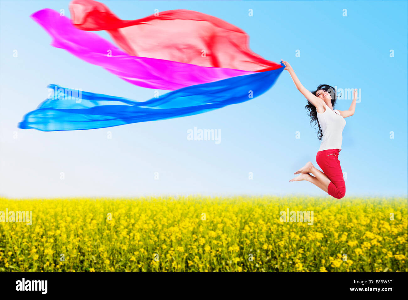 indian Girl Jumping field fun Dupatta Stock Photo - Alamy