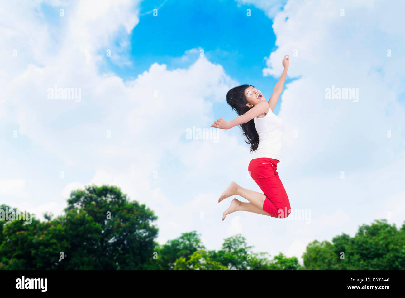 indian Girl Jumping park Stock Photo - Alamy
