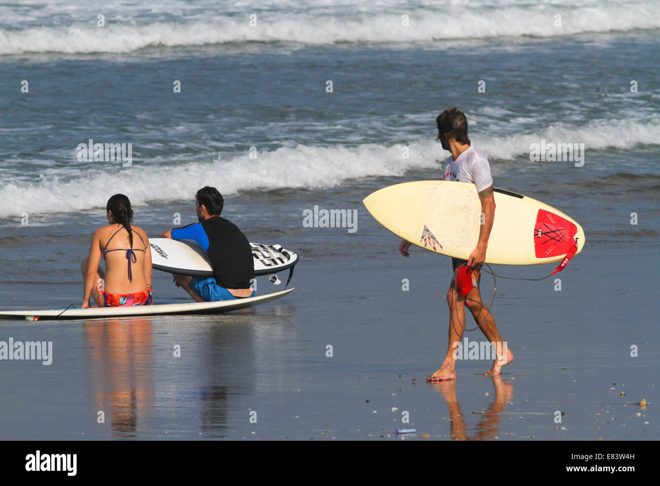 Surfer on the beach. Bali island.Indonesia Stock Photo - Alamy