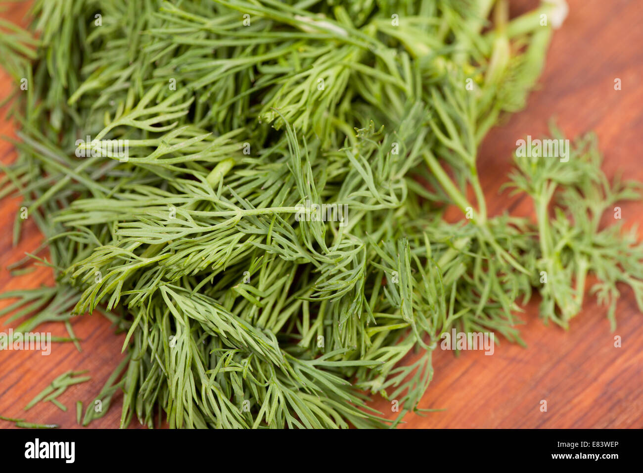 chopped fresh dills on the chopping board Stock Photo - Alamy