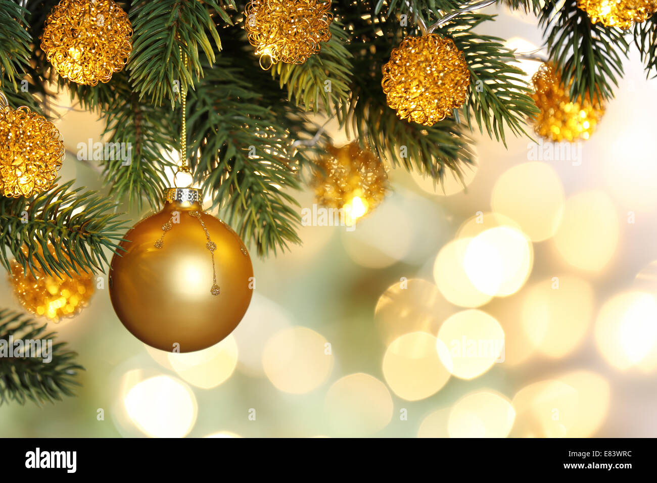 Golden hanging christmas ornament hi-res stock photography and images ...