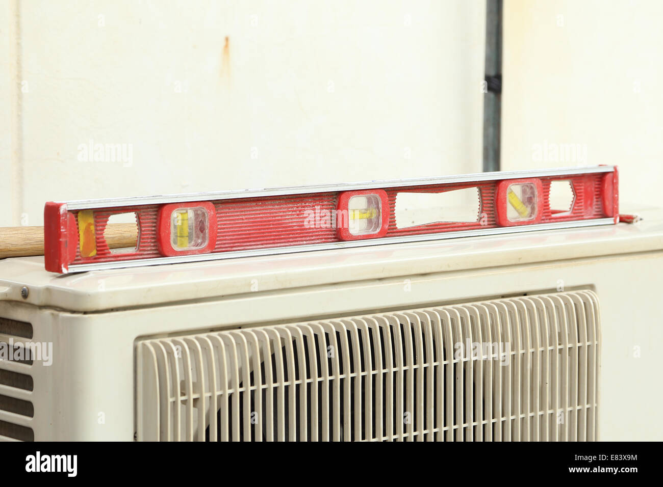 level meter checking for installing air conditioner Stock Photo - Alamy