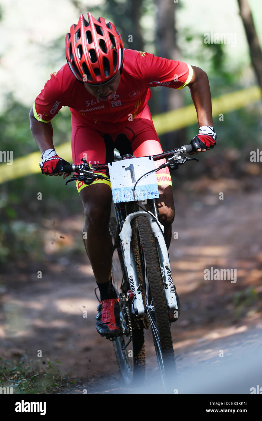 Incheon, South Korea. 30th Sep, 2014. Liu Xinyang of China competes ...