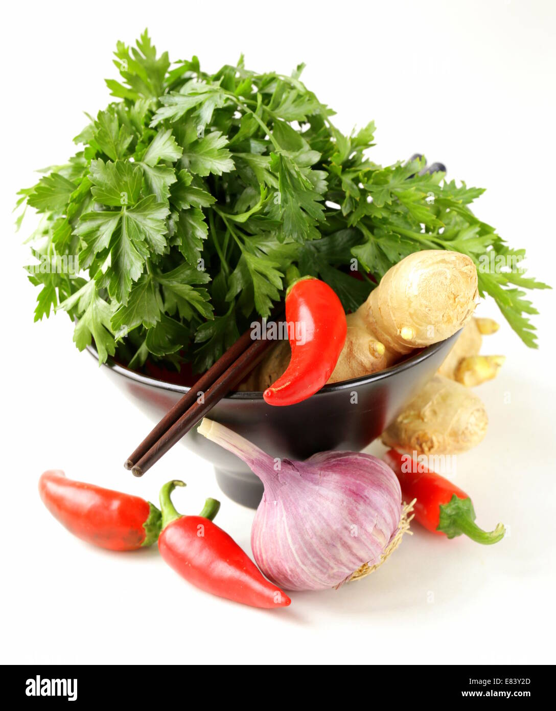 Asian food ingredients (ginger, chilli, coriander and garlic) in ...