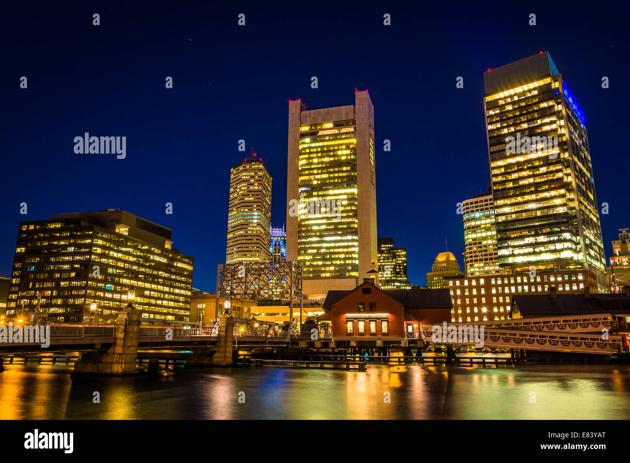 The Boston skyline at night, seen from Fort Point, Boston ...