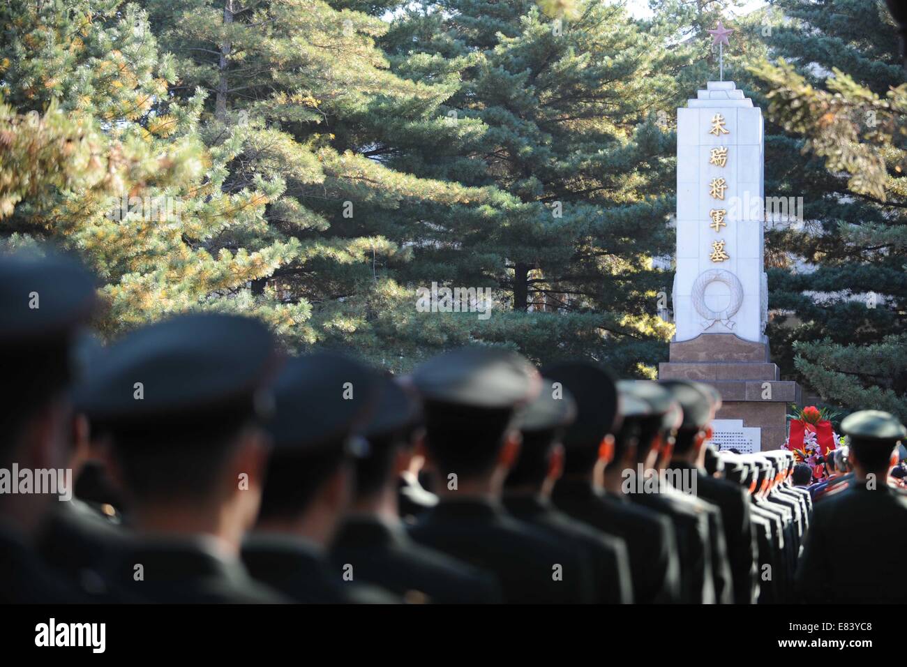 Harbin. 30th Sep, 2014. Soldiers attend a memorial ceremony at a martyr ...