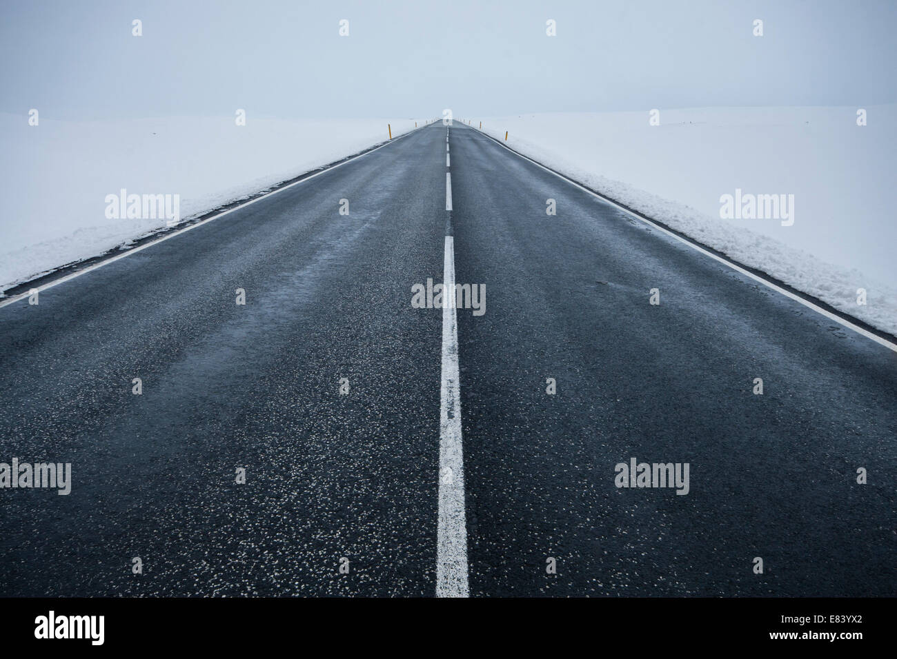 road in snowy landscape Stock Photo - Alamy