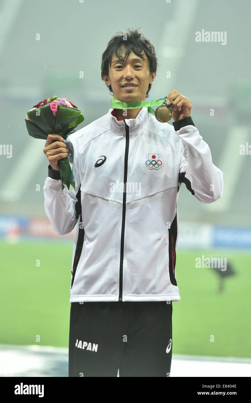 Incheon, South Korea. 28th Sep, 2014. Kei Takase (JPN) Athletics : Men's 100m medal ceremony at ...