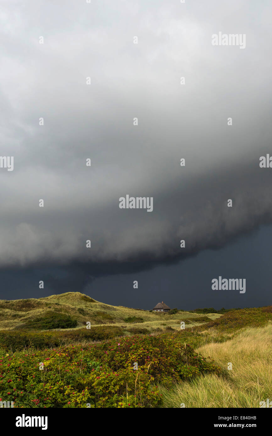 Dramatic storm clouds over dunes, Henne Strand, Region of Southern ...
