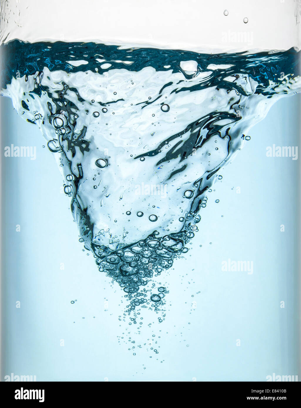 Whirlpool underwater in blue Stock Photo - Alamy