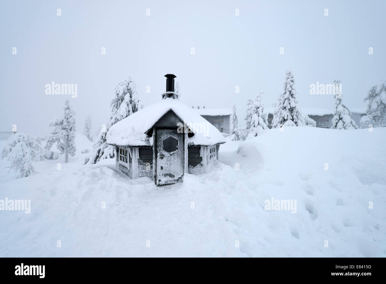 Finnish Kota in a snow-covered landscape, Iso Syöte, Lapland, Finland ...