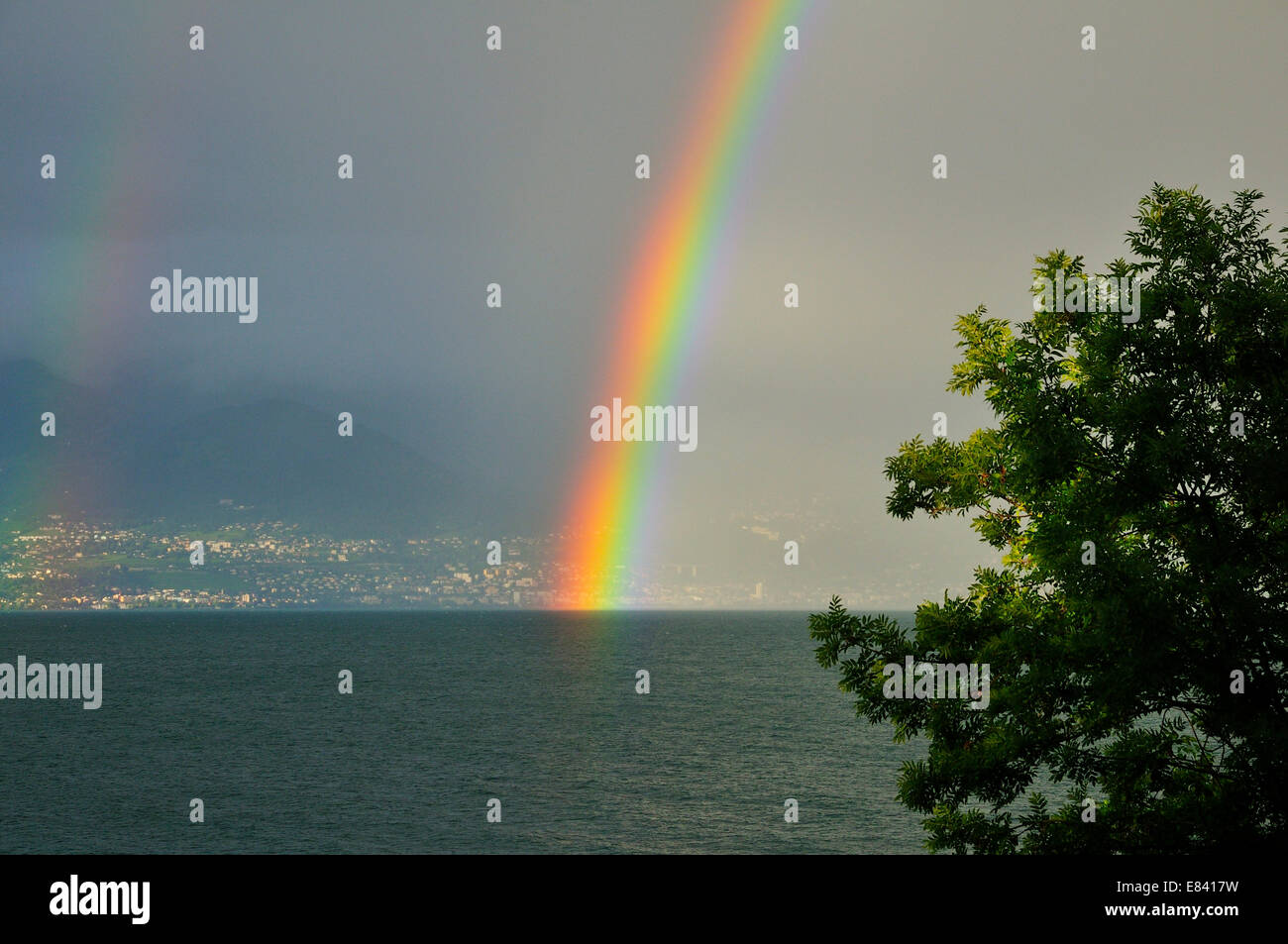 Rainbow on the shore at Lausanne, Switzerland, from France, Lake Geneva ...