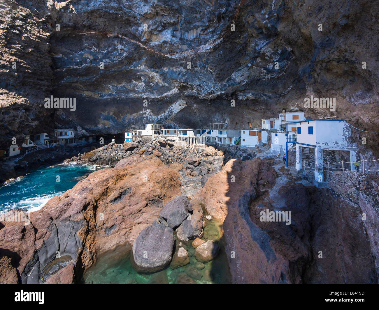Poris de Candelaria, houses in a cave, rocky coast on the Camino del ...