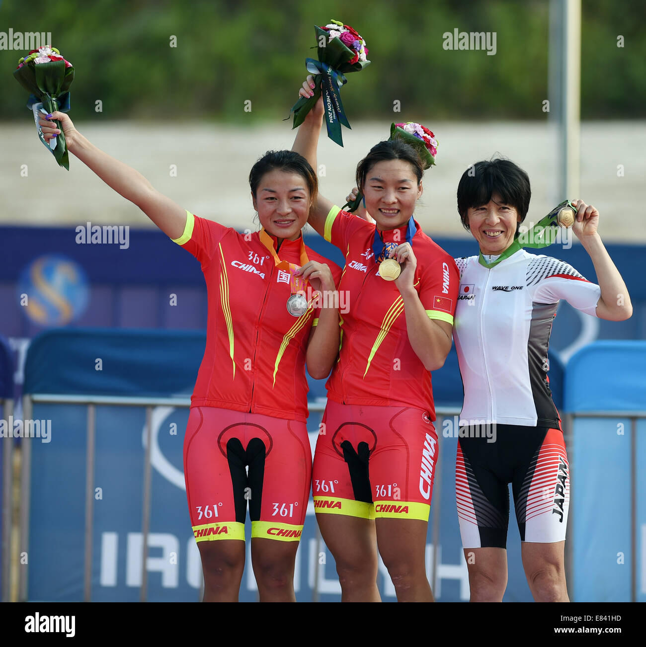 Incheon, South Korea. 30th Sep, 2014. Gold medalist Shi Qinglan (C) of ...