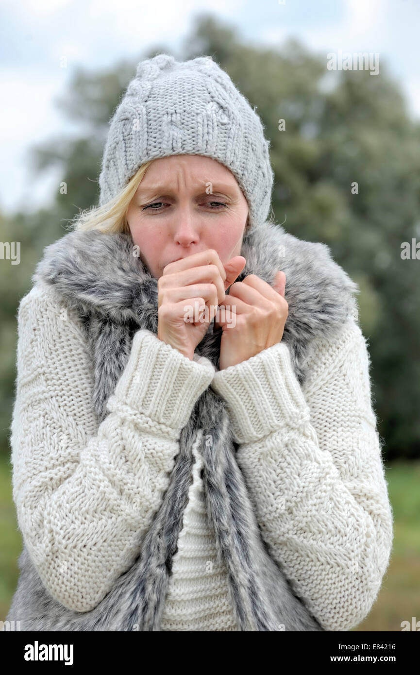 Woman is coughing Stock Photo - Alamy