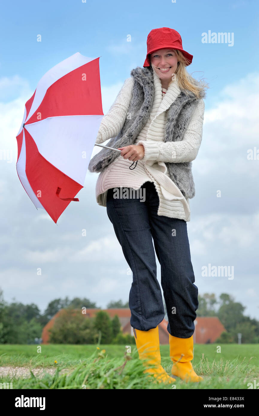Woman gust wind hi-res stock photography and images - Alamy