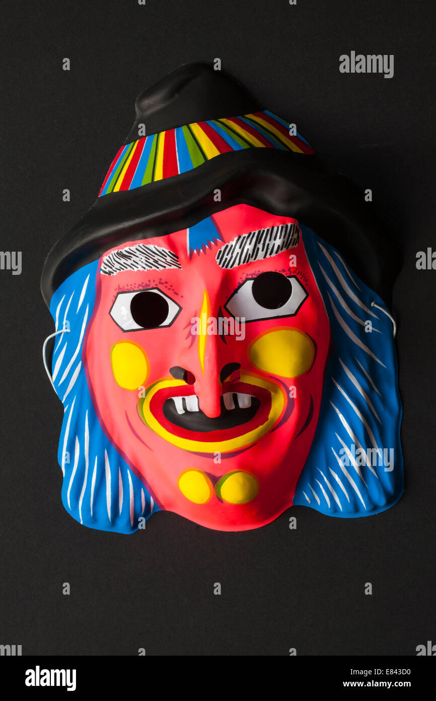 Scary halloween mask isolated on black background Stock Photo - Alamy