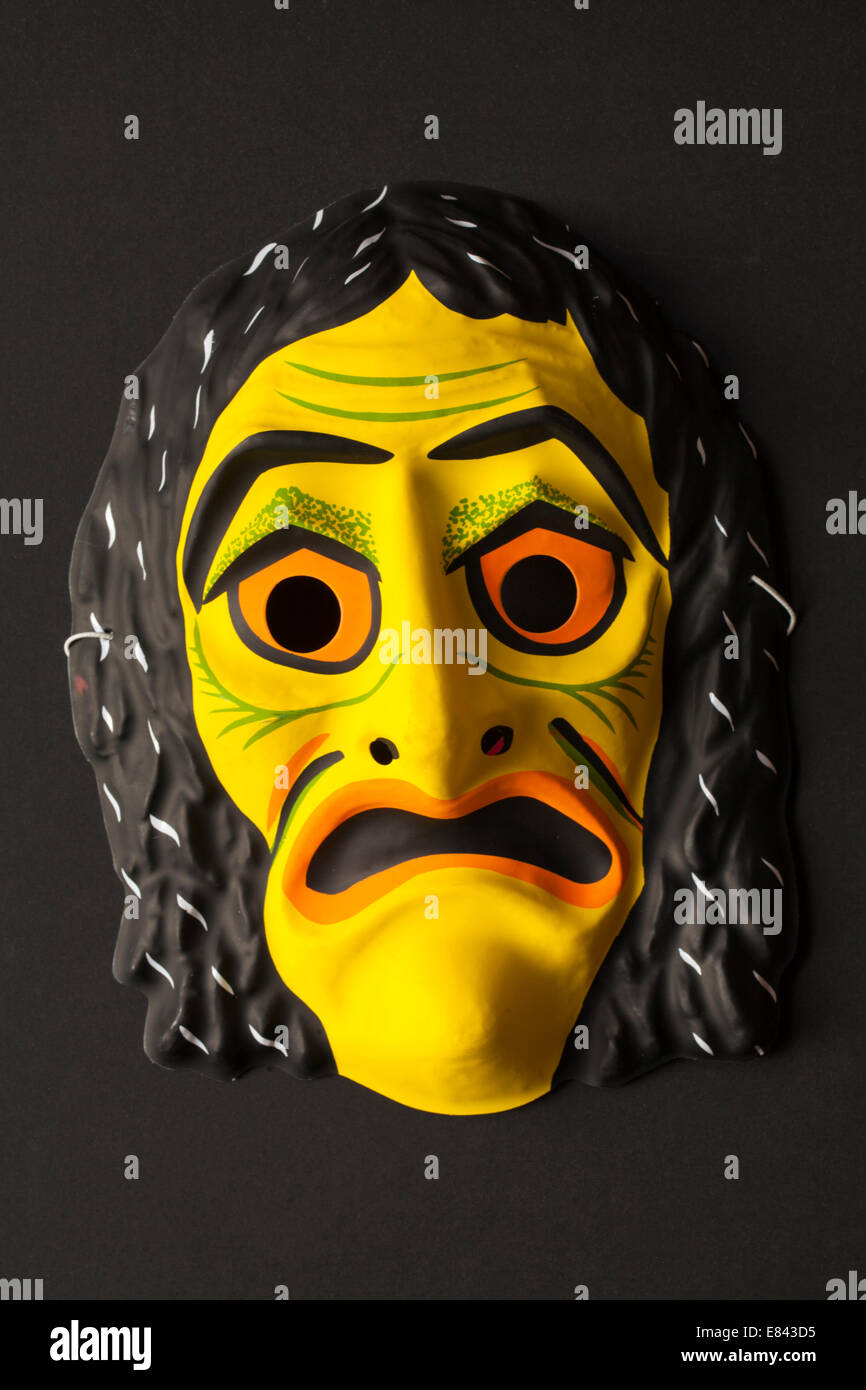Scary halloween mask isolated on black background Stock Photo - Alamy