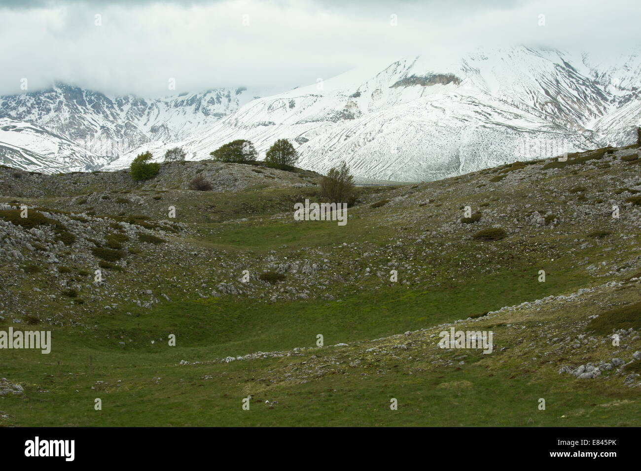 A doline or swallow-hole on limestone in Gran Sasso National Park ...