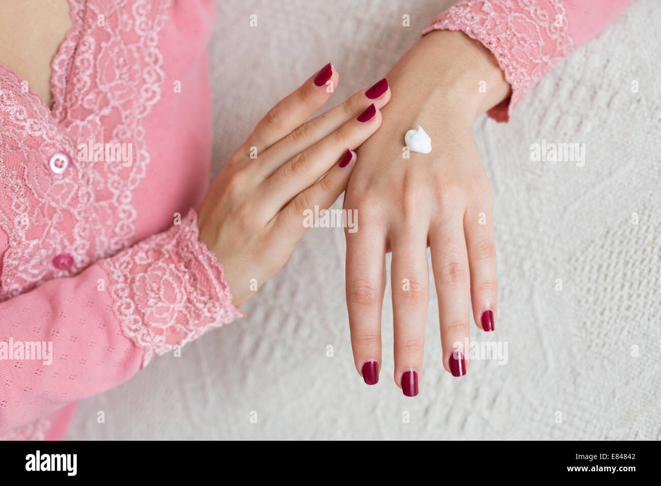 Woman rub hand cream hi-res stock photography and images - Alamy