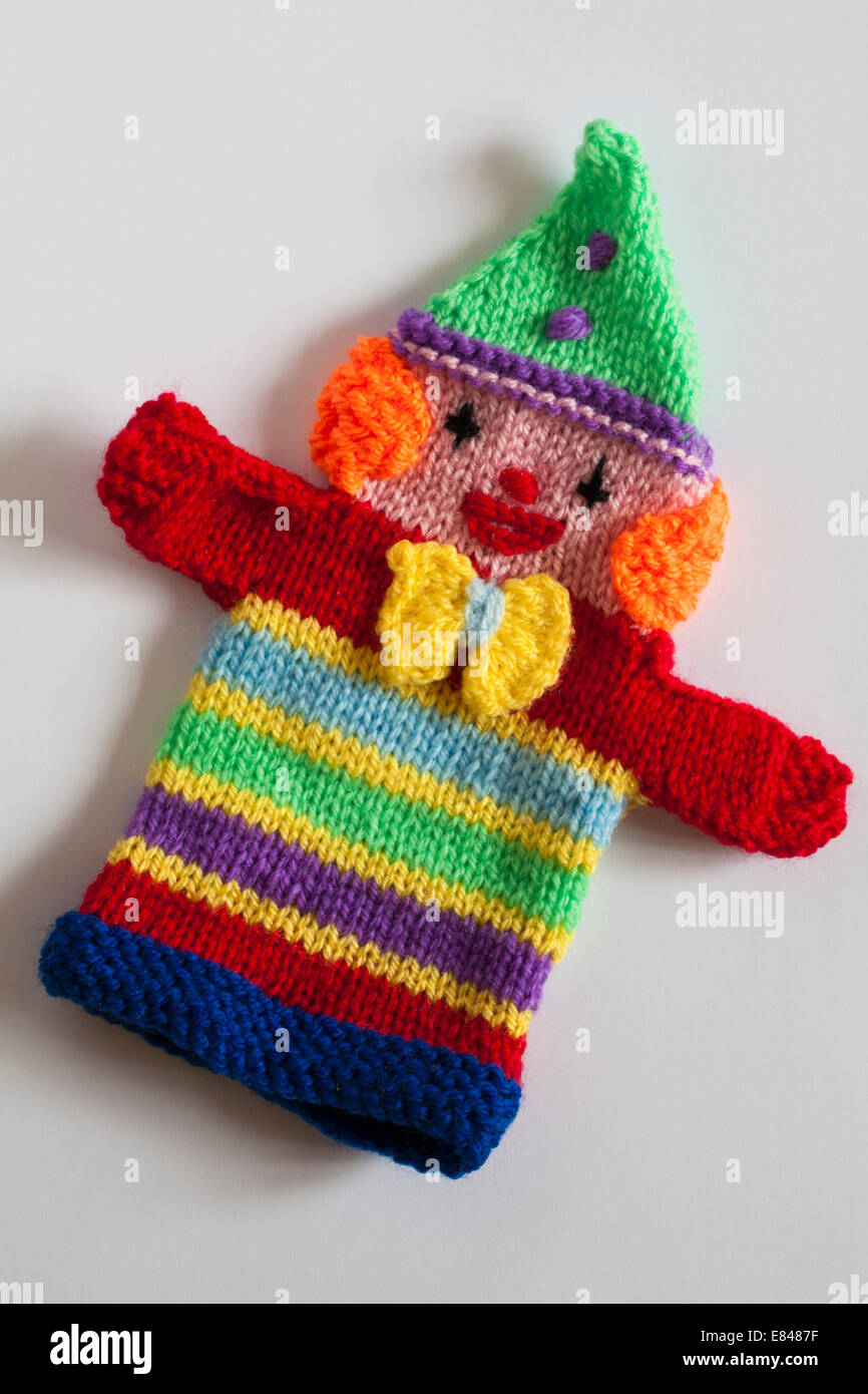 hand knitted clown glove puppet on white background Stock Photo - Alamy