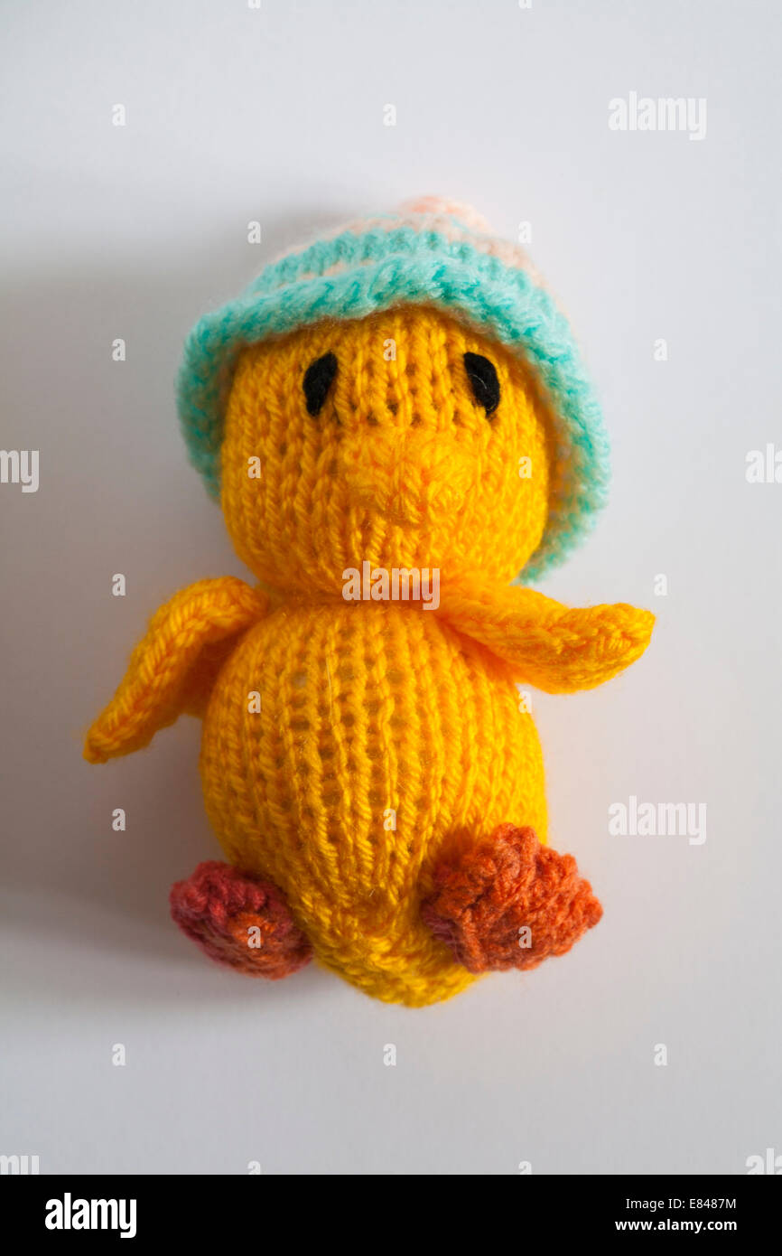 hand knitted chick wearing hat isolated on white background Stock Photo ...
