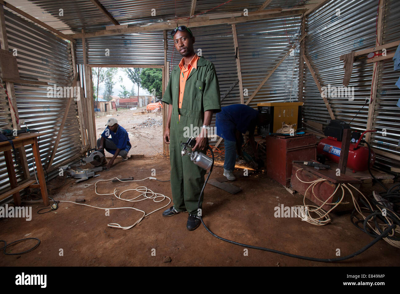 Rwandan welder in his metal and wood workshop, Kigali, Rwanda Stock ...